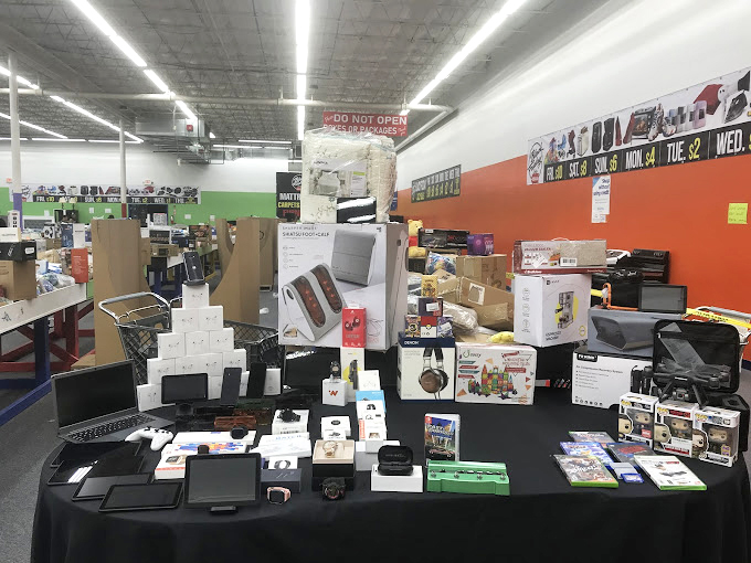 A carefully curated display of electronics that would make any gadget lover's heart skip a beat. Retail therapy meets tech support.