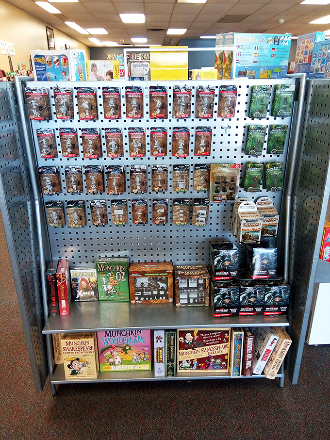 Gaming accessories aren't afterthoughts here&mdash;these meticulously organized miniatures and card games command their own dedicated display space.