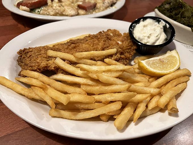 A fish sandwich that puts fast food versions to shame, with golden-fried goodness nestled in a soft bun with all the fixings.