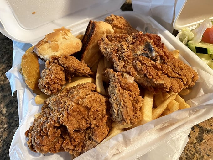 Fried chicken that's traveled to the exact intersection of crispy and juicy, with fries that could make a potato farmer weep with pride.
