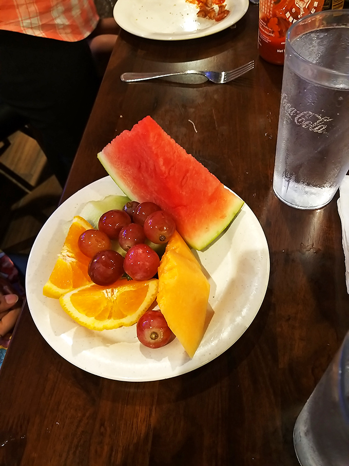 The fruit plate&mdash;that noble attempt to balance out the previous three plates of General Tso's. Nice try, we see what you're doing there.
