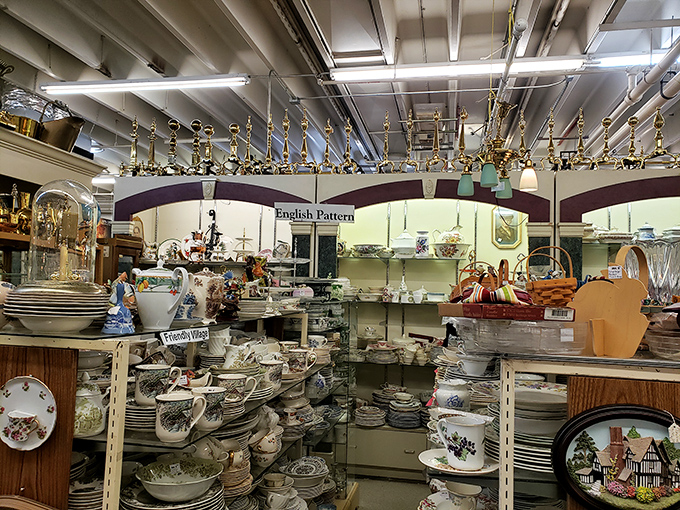 Fine china and delicate porcelain stack precariously on shelves, each pattern more intricate than the last. Your grandmother would approve of this display.