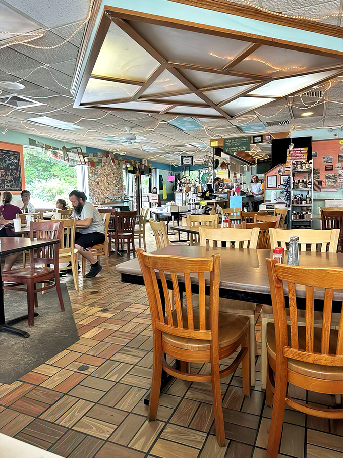 Where wooden chairs, tiled floors, and string lights create the perfect backdrop for seafood epiphanies. Notice nobody's looking at their phones?