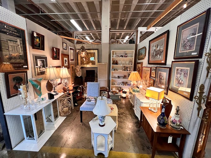A gallery-like approach to antiquing—this booth's thoughtful arrangement transforms everyday objects into an artistic still life.