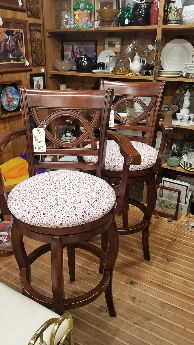 Elegant bar stools that invite you to sit and contemplate your purchases. The floral cushions say "comfort" while the craftsmanship whispers "quality."