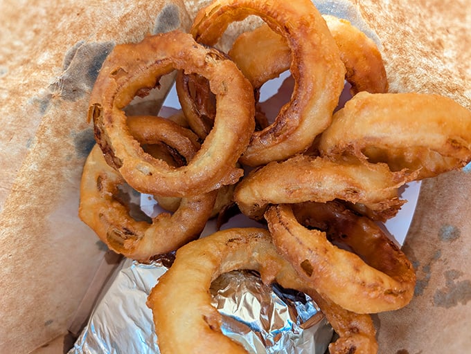 Onion rings that achieve that perfect balance&mdash;crispy enough to make noise when bitten, substantial enough to satisfy the deepest fried food cravings.
