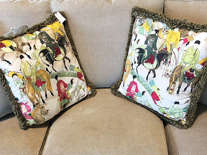 These aren't just throw pillows—they're wearable art for your sofa that costs less than an actual Hermès scarf.