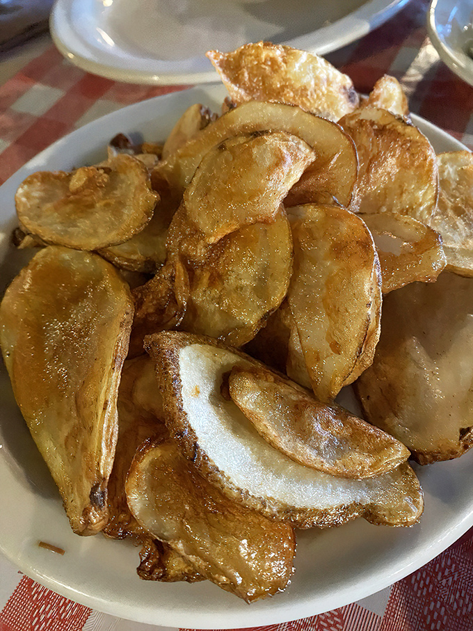 These aren't your sad bagged chips&mdash;these house-made potato crisps shatter with each bite, leaving you wondering why you'd ever settle for less.
