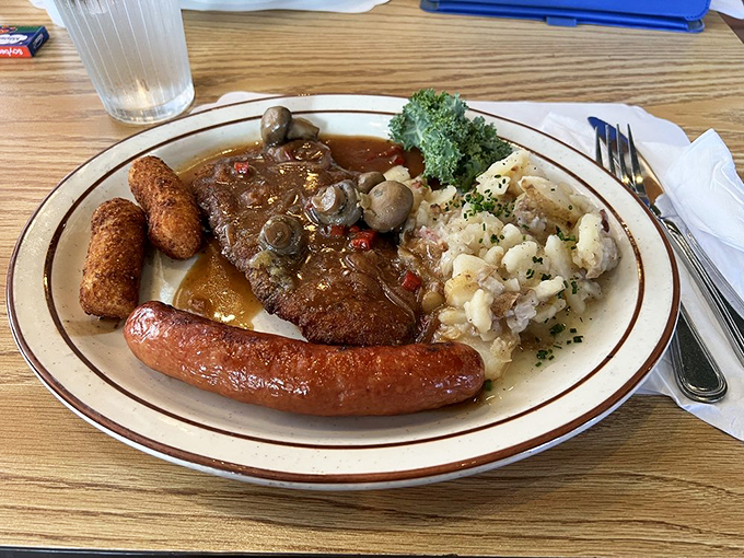 The sampler platter: where indecision becomes a virtue. Schnitzel, sausage, and sides that turn your table into a Bavarian buffet.