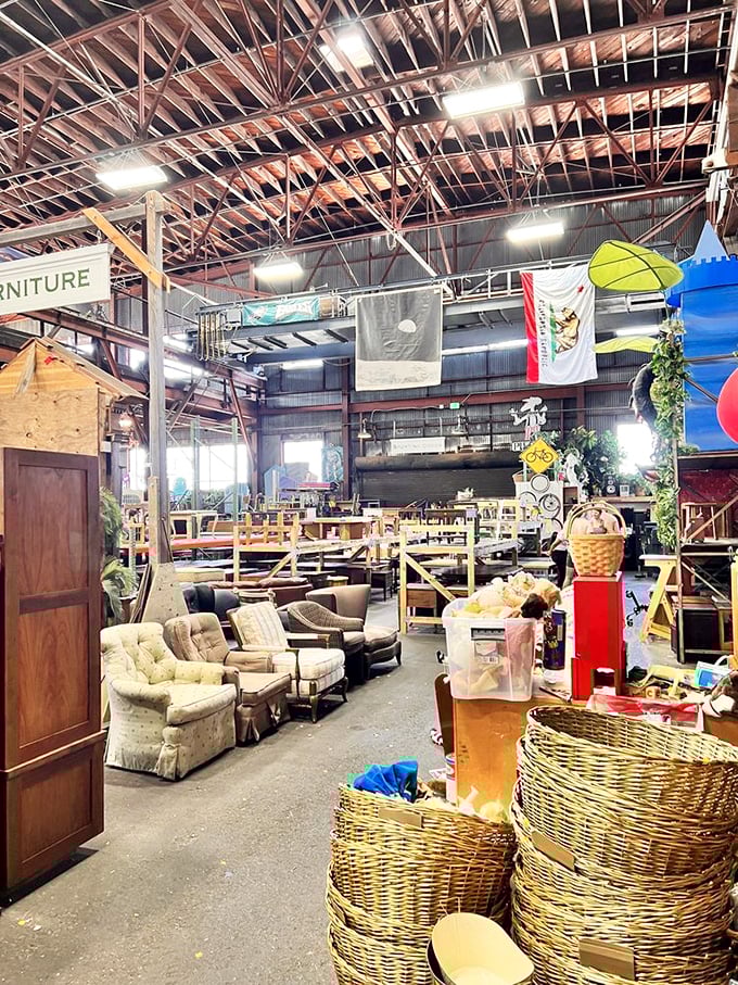 Urban Ore's cavernous interior stretches toward infinity, with treasures organized into islands of possibility under industrial rafters.