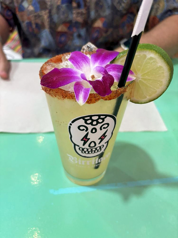 Their margarita comes dressed for the occasion with a purple orchid garnish—because when your building is hot pink, your cocktails need to keep up.