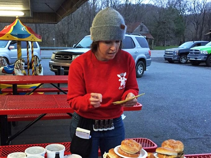 Vintage kiddie rides that entertain the young while adults debate the merits of adding extra cheese. Childhood joy preserved alongside culinary traditions. 