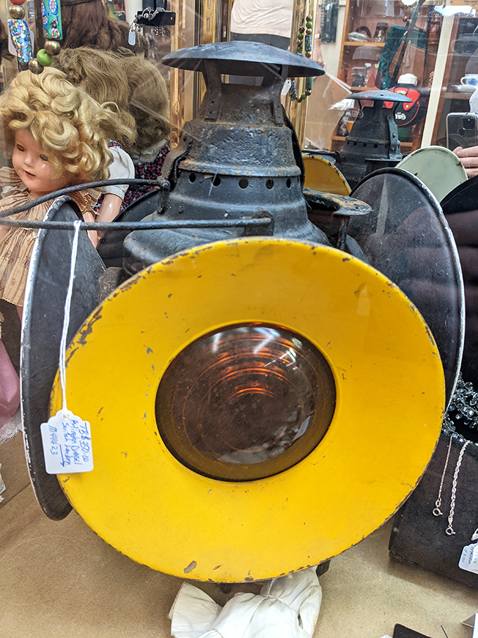 That yellow railroad lantern probably guided more midnight journeys than we'll ever know. Industrial design when function and form were married, not just dating.