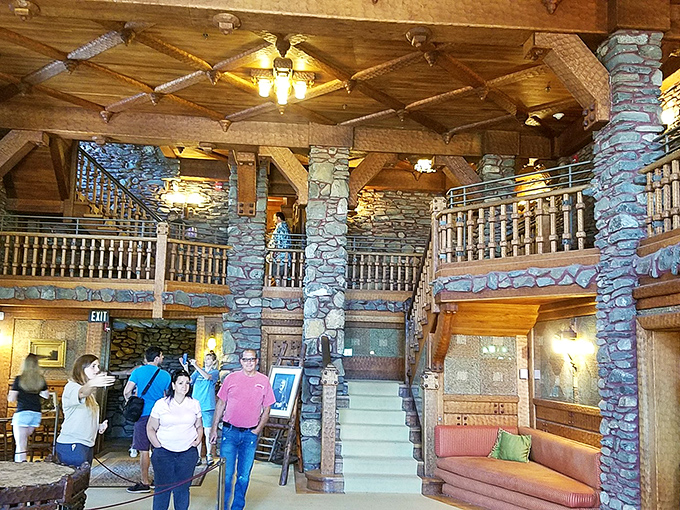 The castle's grand interior welcomes modern-day explorers with soaring ceilings and stone pillars that make everyone feel like visiting royalty.