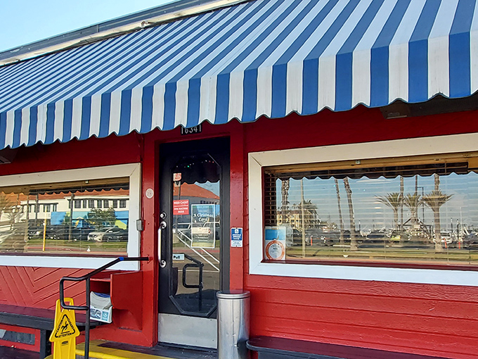 Harbor House Cafe: That vibrant red building with the beach mural isn't just a restaurant&mdash;it's a 24-hour sanctuary for the hungry.