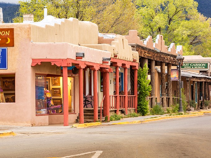 Taos' historic adobe architecture creates a living museum where centuries-old building techniques naturally regulate both temperature and housing costs.