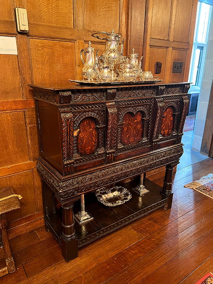 This ornately carved sideboard displays silver service fit for royalty&mdash;the kind of heirloom furniture that makes your grandmother's china cabinet look positively IKEA in comparison.