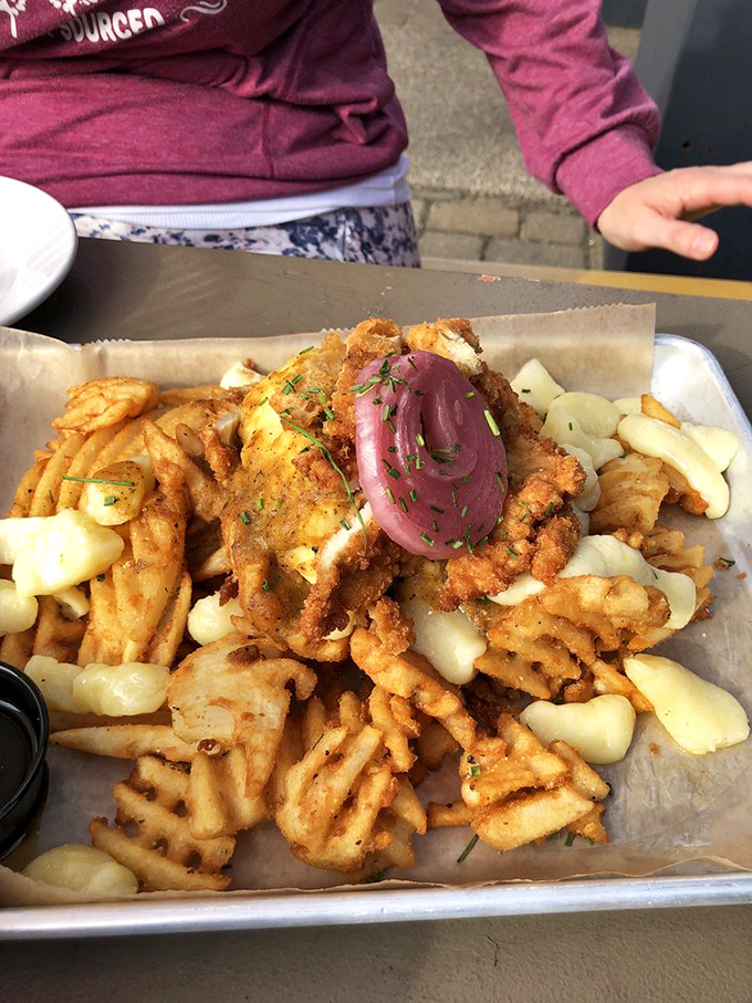 Waffle fries elevated to an art form with toppings that make regular poutine look like it's not even trying.