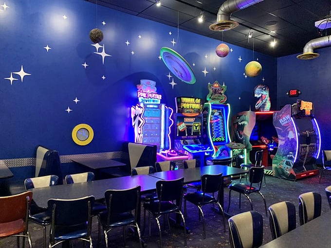 The arcade area: where earthling children can train for future space missions while parents refuel on barbecue and beer.