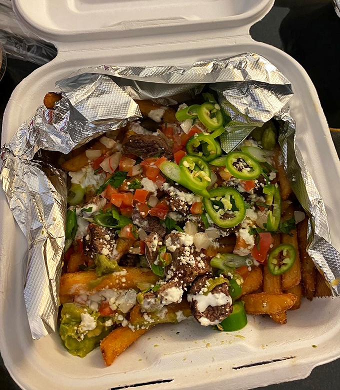 Asada fries&mdash;the culinary equivalent of a bear hug. Crispy potatoes playing host to a fiesta of toppings that would make any potato proud.