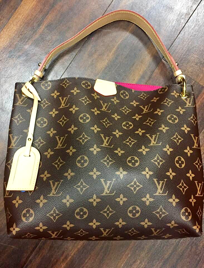 Louis Vuitton without the financial guilt trip. This handbag carries both your essentials and your savvy shopping reputation.