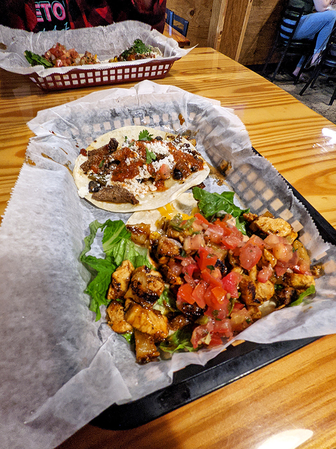 Three amigos ready for their close-up. These Baja-style beauties prove tacos can be photogenic and delicious simultaneously.