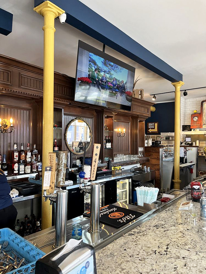 The bar area blends classic charm with modern flair, where bourbon and conversation flow as smoothly as the Mississippi just miles away.