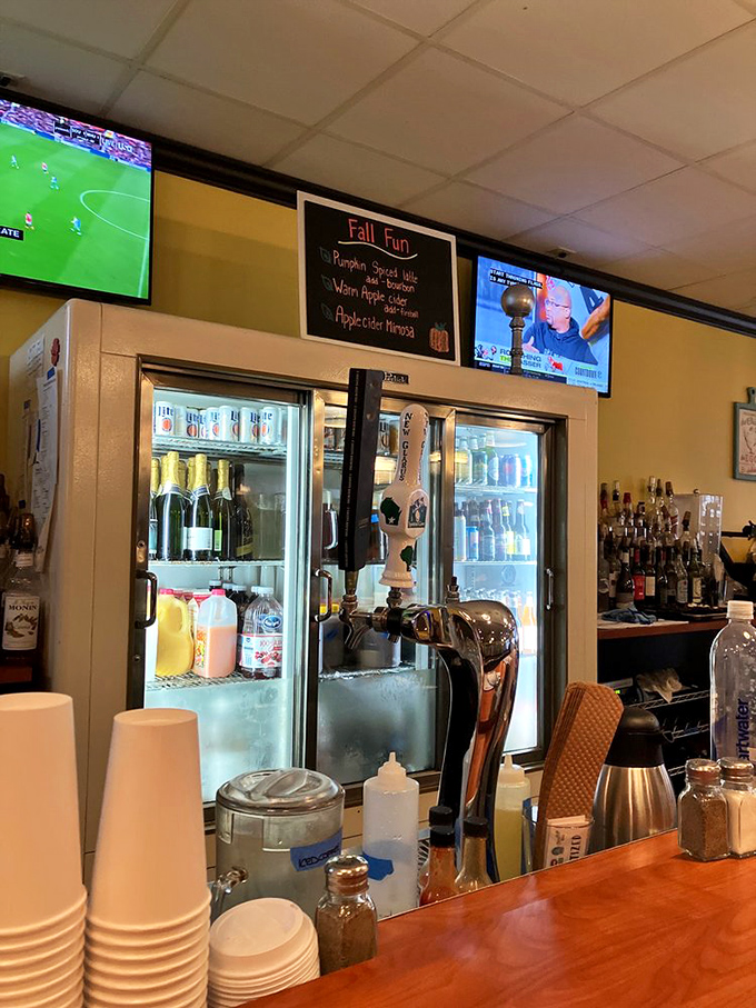 The bar area whispers promises of morning mimosas and Bloody Marys, because sometimes breakfast needs a little extra sparkle.