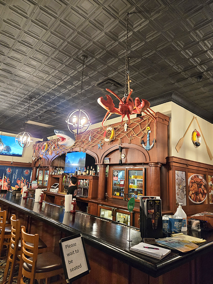 A giant lobster presides over the bar like a crimson guardian. He's seen things, seafood things.