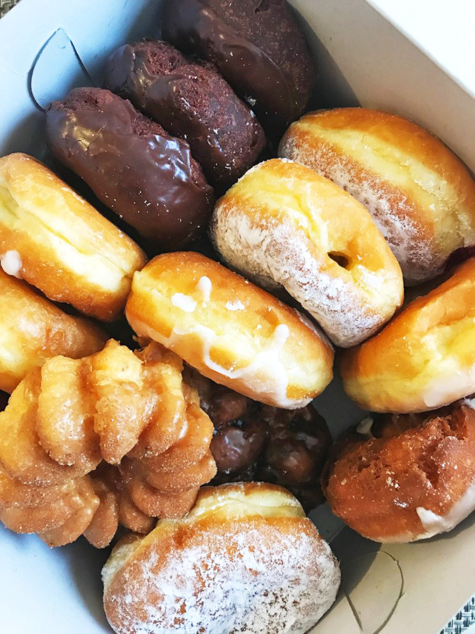 A box of joy containing every donut personality&mdash;from the flashy sprinkle-covered extrovert to the sophisticated chocolate-glazed intellectual.