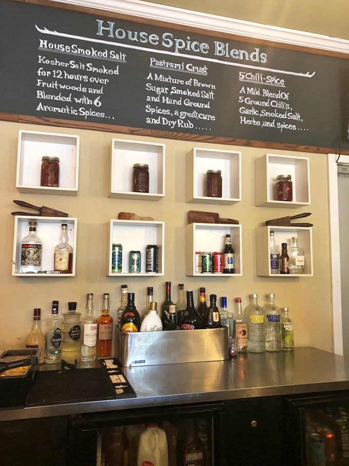 House spice blends line the wall like potions in an alchemist's workshop, transforming ordinary dishes into extraordinary culinary experiences.