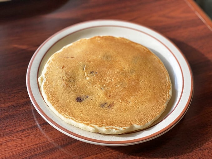 A pancake with the perfect tan, ready for its breakfast beauty shot. Fluffy enough to use as a pillow in a food coma.