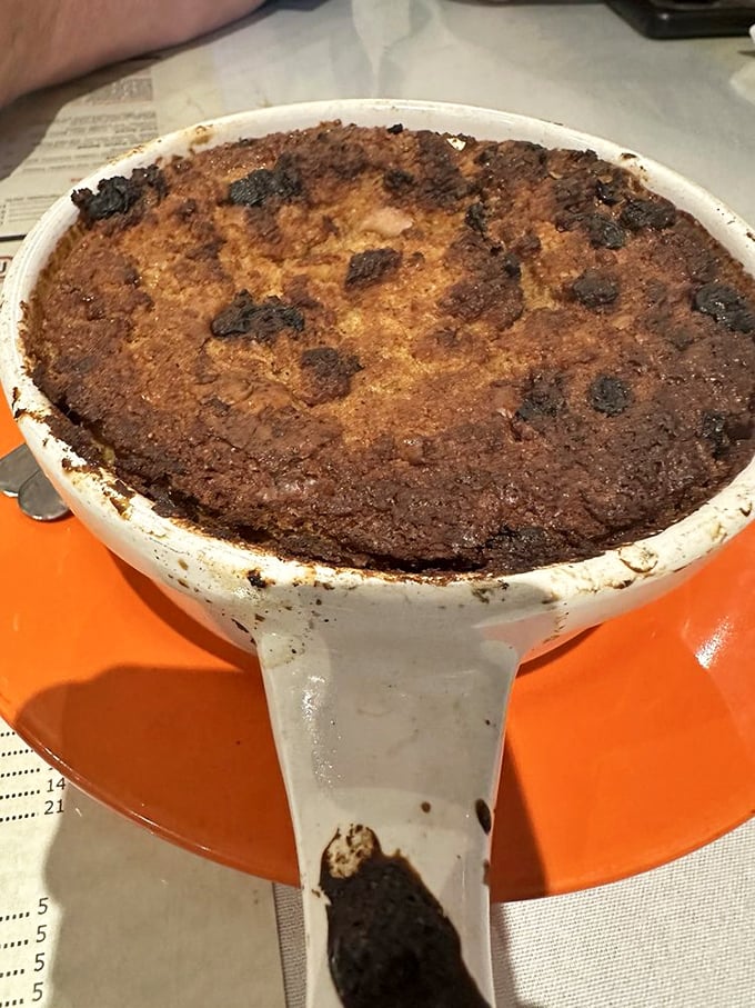 Bread pudding that could settle family feuds, topped with a caramelized crust that makes cr&egrave;me br&ucirc;l&eacute;e jealous.