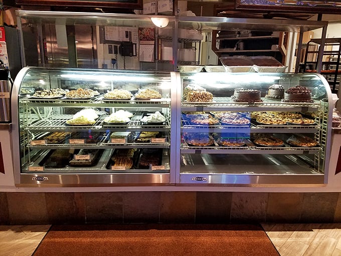 A glass case of temptation. Each shelf offers a different path to dessert nirvana, making "I'll just look" the biggest lie told in Omaha.