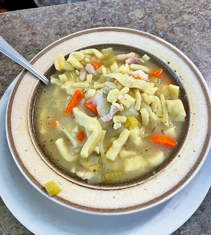 Chicken noodle soup that could heal more than just colds—it might just restore your faith in simple, honest cooking.