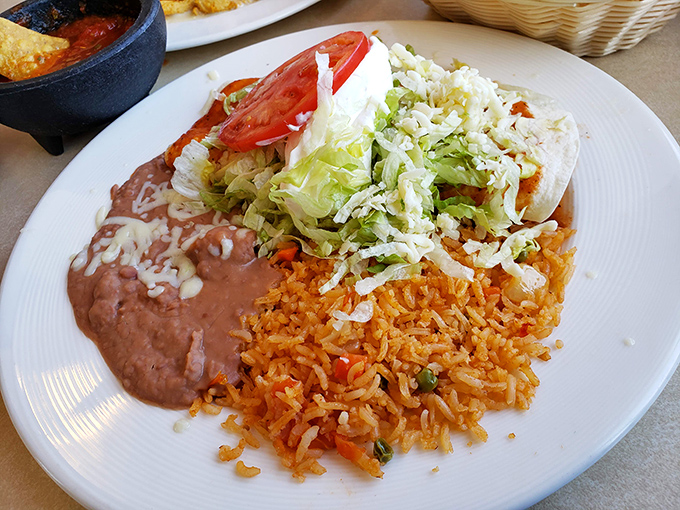 The chimichanga: proof that sometimes the best things in life are deep-fried. This golden-brown masterpiece makes no apologies for its indulgent nature.