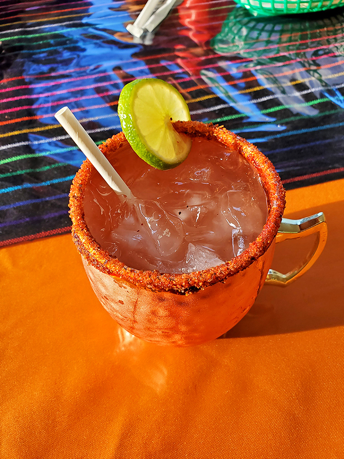 Not your average mall margarita! That tajin rim adds the perfect spicy counterpoint to the tangy lime freshness inside.
