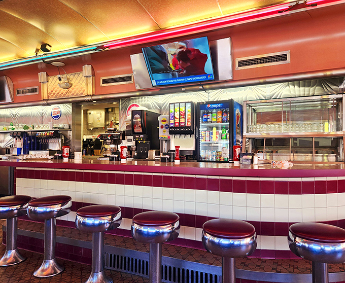 The counter where regulars become family and coffee cups are never empty. Those stools have supported generations of Lancaster stories. 