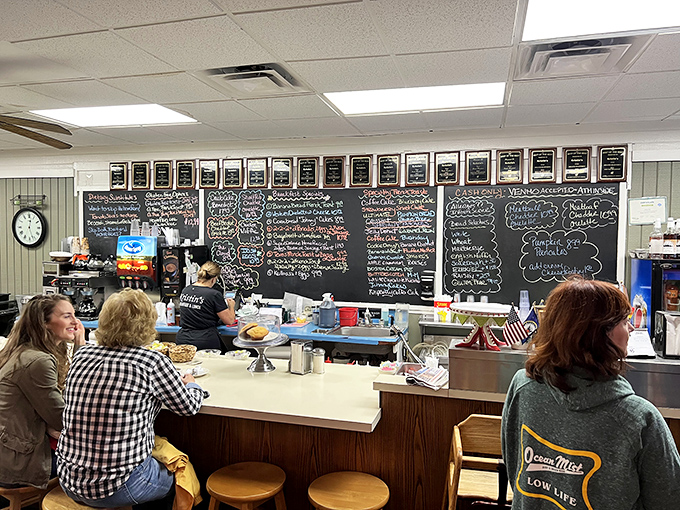 The blackboard menu writes breakfast poetry in colorful chalk, promising specials that locals know to look for and newcomers quickly learn to treasure.