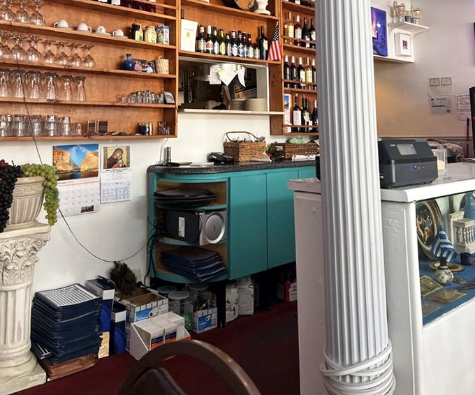 Behind every great Greek restaurant is a counter like this&mdash;bottles lined up like soldiers ready for culinary battle.