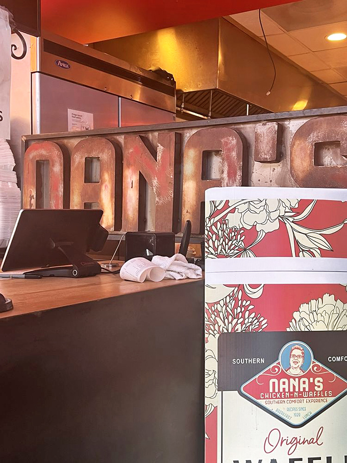 Behind the counter, where Southern comfort food dreams come to life. The weathered "NANA'S" sign tells you this place means business.