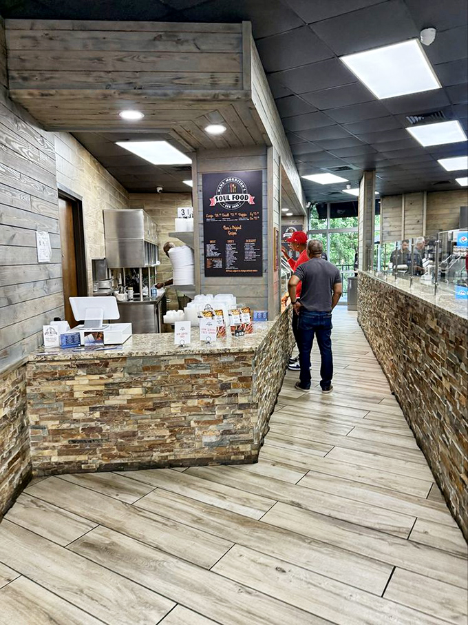 The ordering counter&mdash;where dreams are placed and fulfilled. The wood and stone details add warmth to this temple of comfort food.