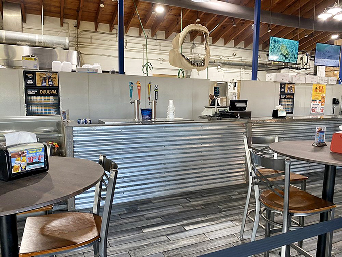 The ordering counter&mdash;where dreams and hunger meet. That shark jaw overhead is just reminding you who's really at the top of the food chain.