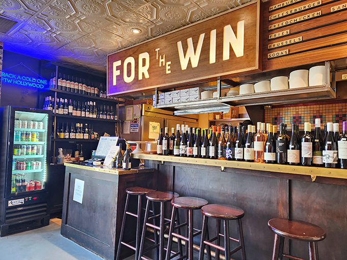 The bar setup proves For The Win isn't just about burgers—their craft beer and wine selection deserves its own standing ovation.