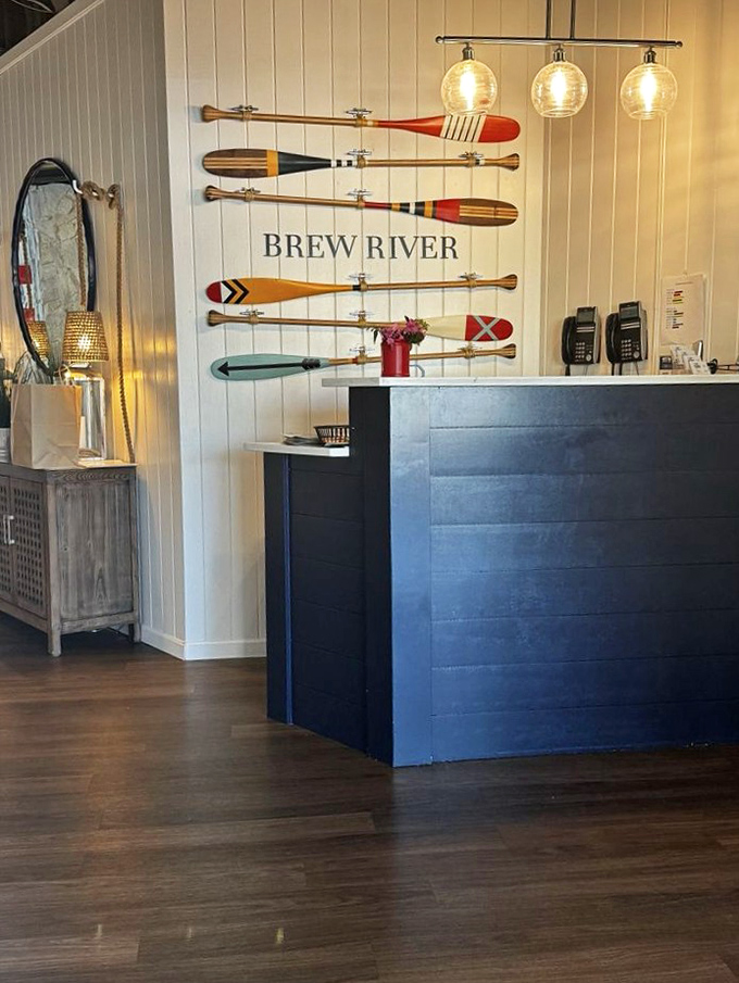 The reception area welcomes with nautical flair—those colorful oars aren't just decoration, they're storytellers of Chesapeake Bay adventures past.