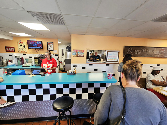 The counter seats&mdash;breakfast's front-row tickets. Where solo diners find community and coffee refills appear like caffeinated magic.