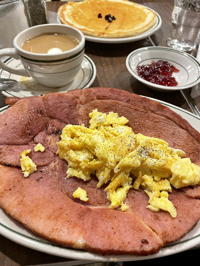 Country ham with scrambled eggs—a plate that's been solving morning hunger emergencies since your grandparents were dating. Simple, honest food.