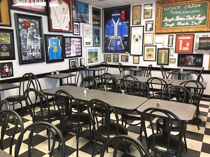 Sports jerseys and memorabilia create a gallery of local pride. This isn't decoration—it's a community scrapbook hung on the wall.