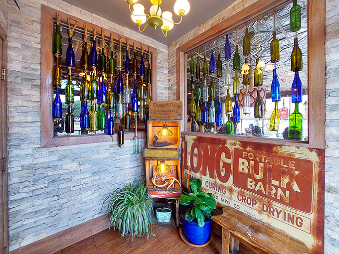 Whimsical bottle art transforms this corner into an impromptu gallery. The kind of quirky, thoughtful touch that separates good restaurants from great ones.