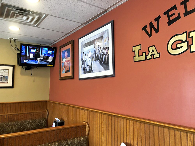 Warm wood paneling and coral walls create an atmosphere as comforting as the food. You're not a customer here&mdash;you're family.